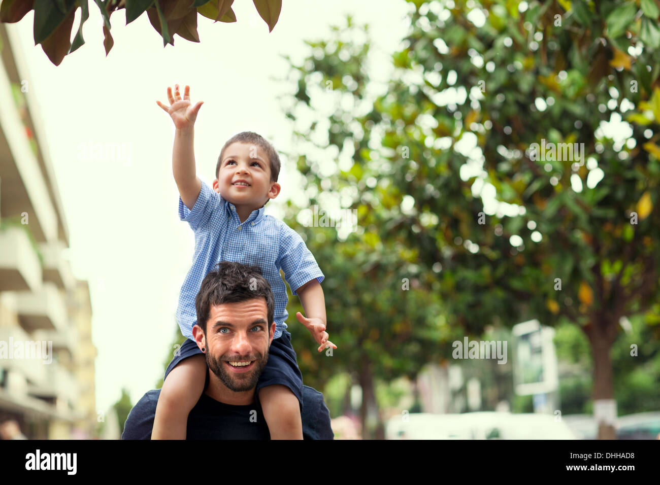 Father carrying son on shoulder hi-res stock photography and images - Alamy