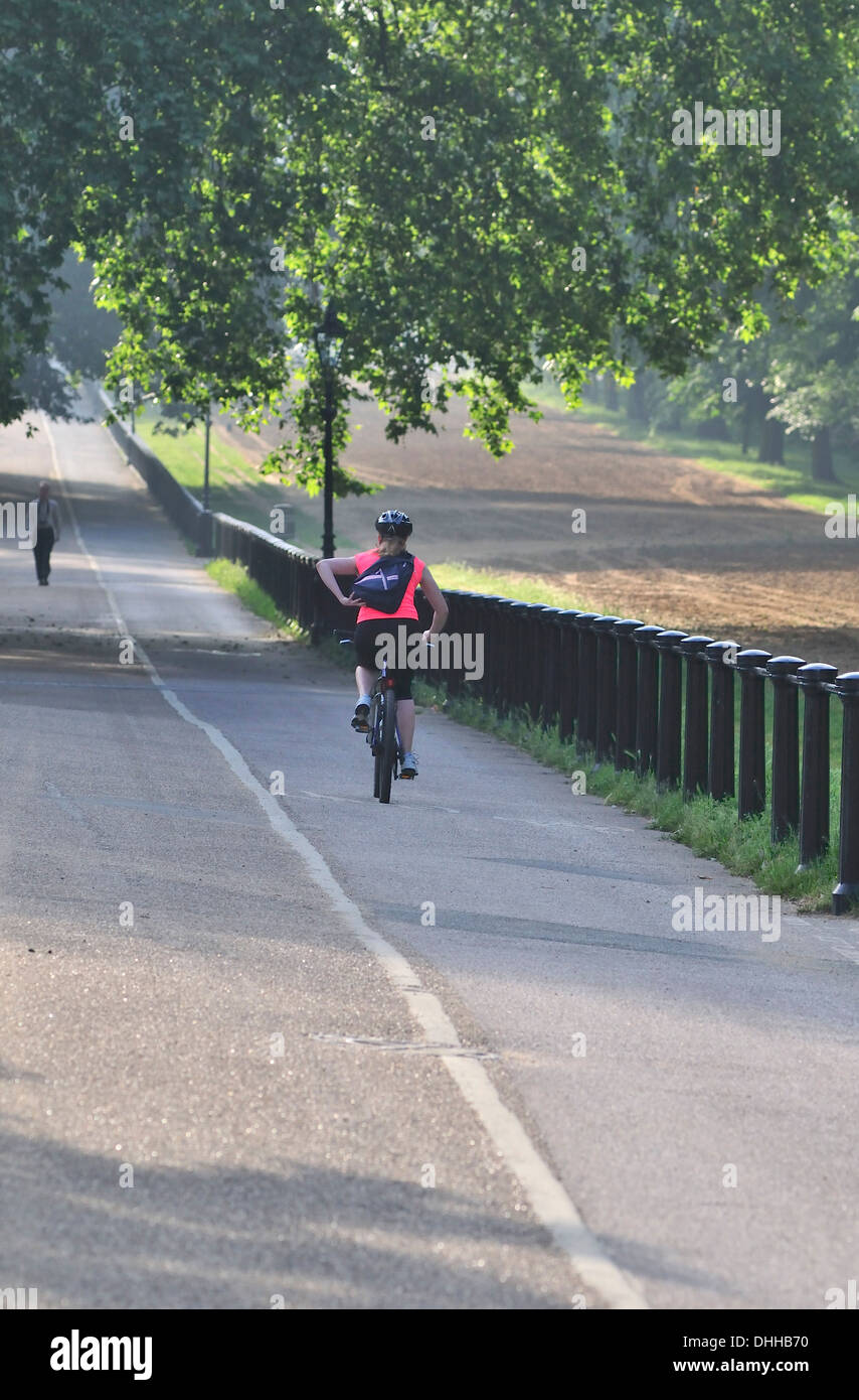 Woman Cycling, Rotten Row, Hyde Park / Kensington Gardens, London ...