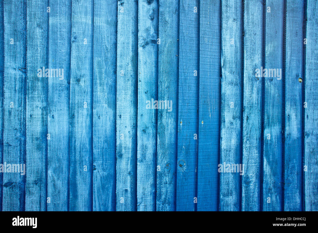 Blue painted fence as a a background image Stock Photo - Alamy