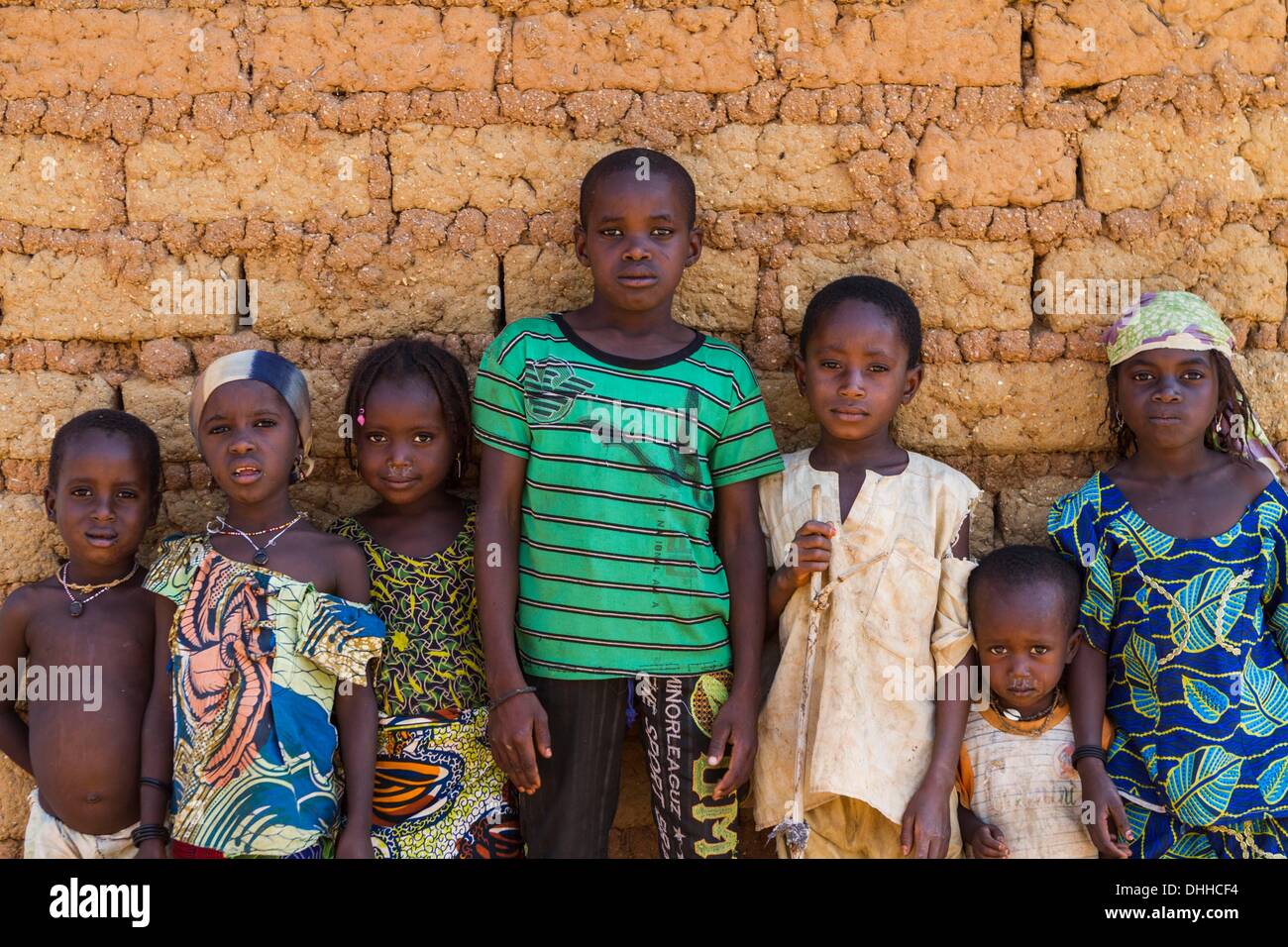 Kajuru, Nigeria. 31st Oct, 2013. Fulani children posing by the wall of ...