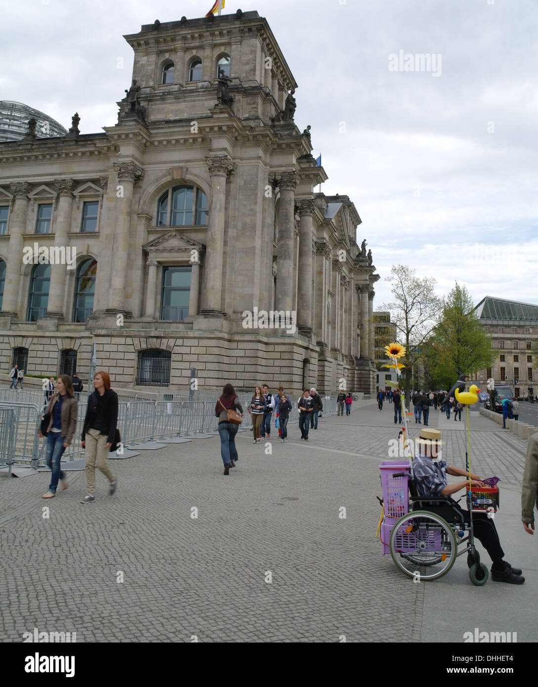Grey sky portrait, to Reichstag, pavement people, disabled man in ...