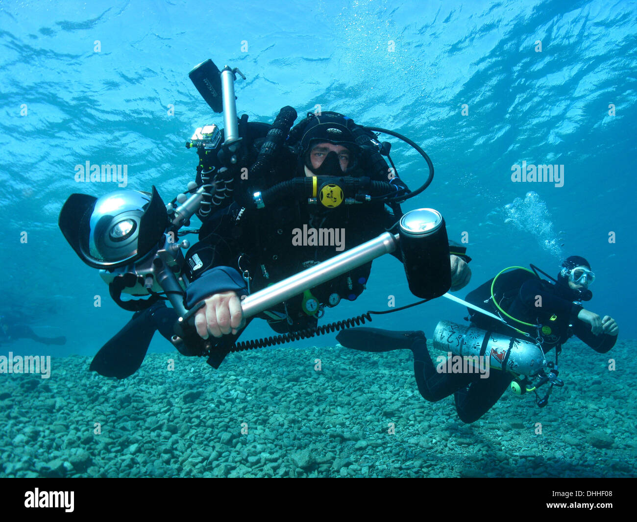 Scuba diver with underwater camera Stock Photo - Alamy