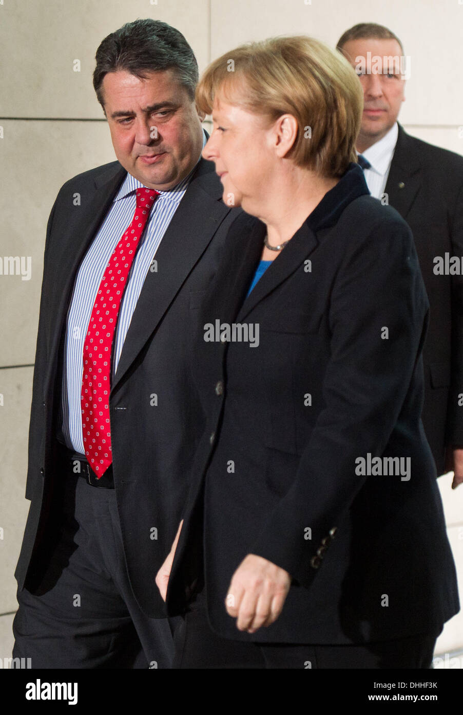 Berlin, Germany. 11th Nov, 2013. SPD chairman Sigmar Gabriel greets ...