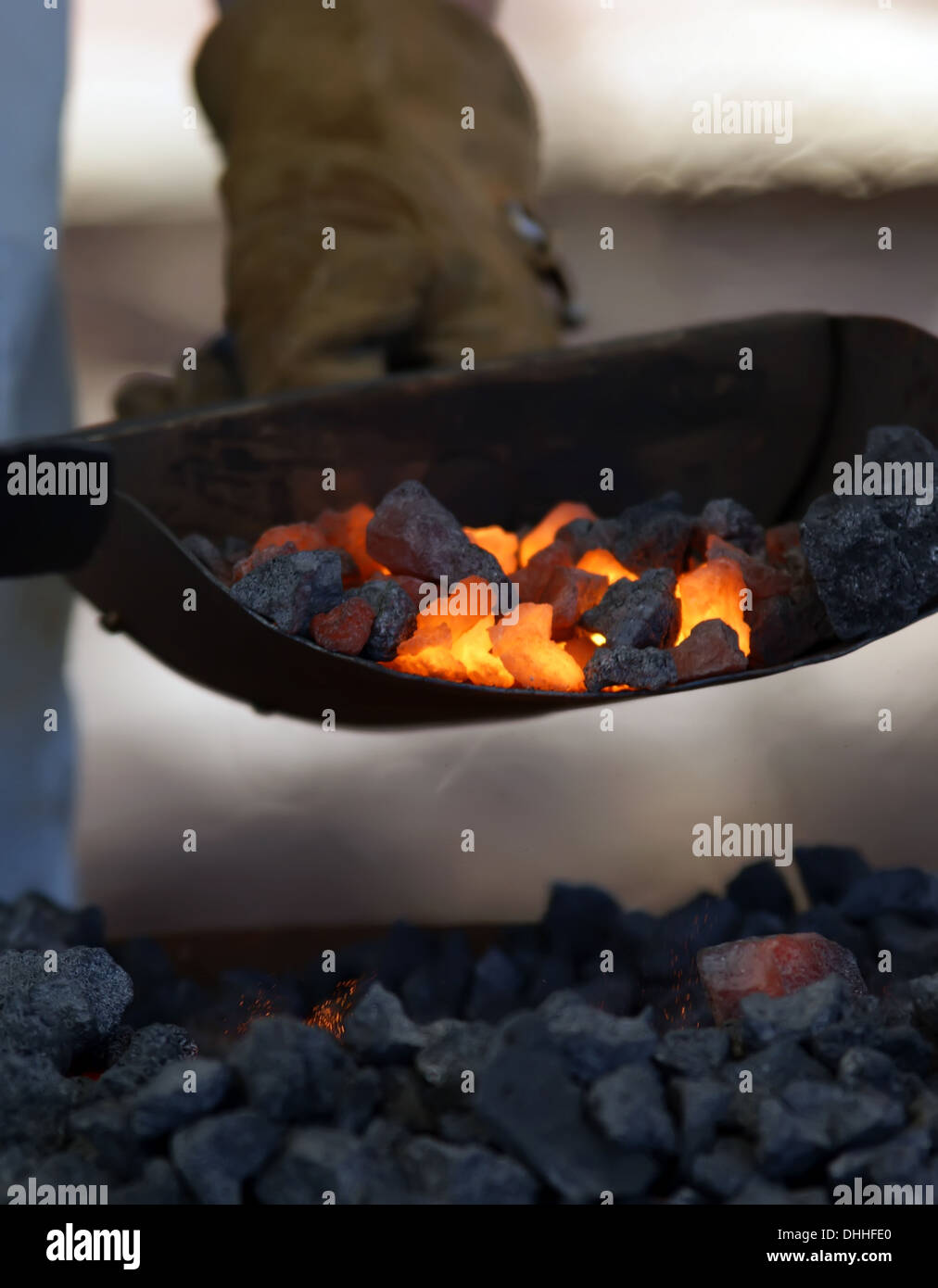 iron smith working near hot coal Stock Photo - Alamy