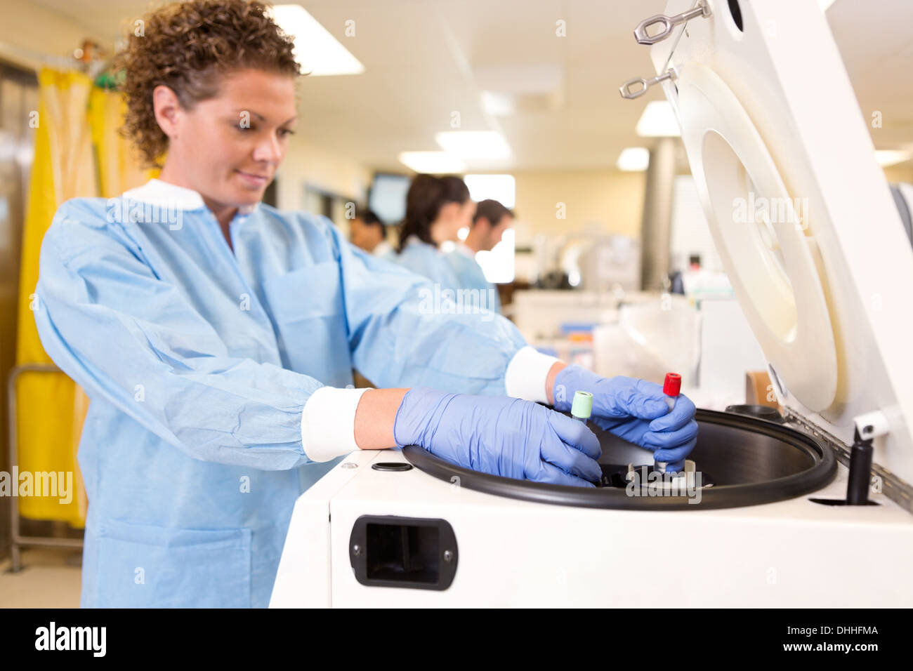 Researcher Loading Samples in Centrifuge Stock Photo - Alamy