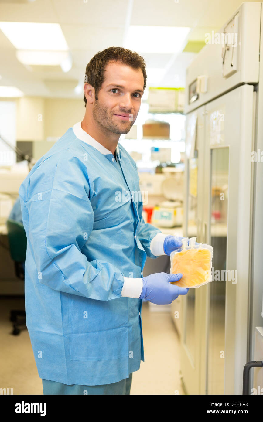 Lab Tech with Frozen Plasma Stock Photo - Alamy