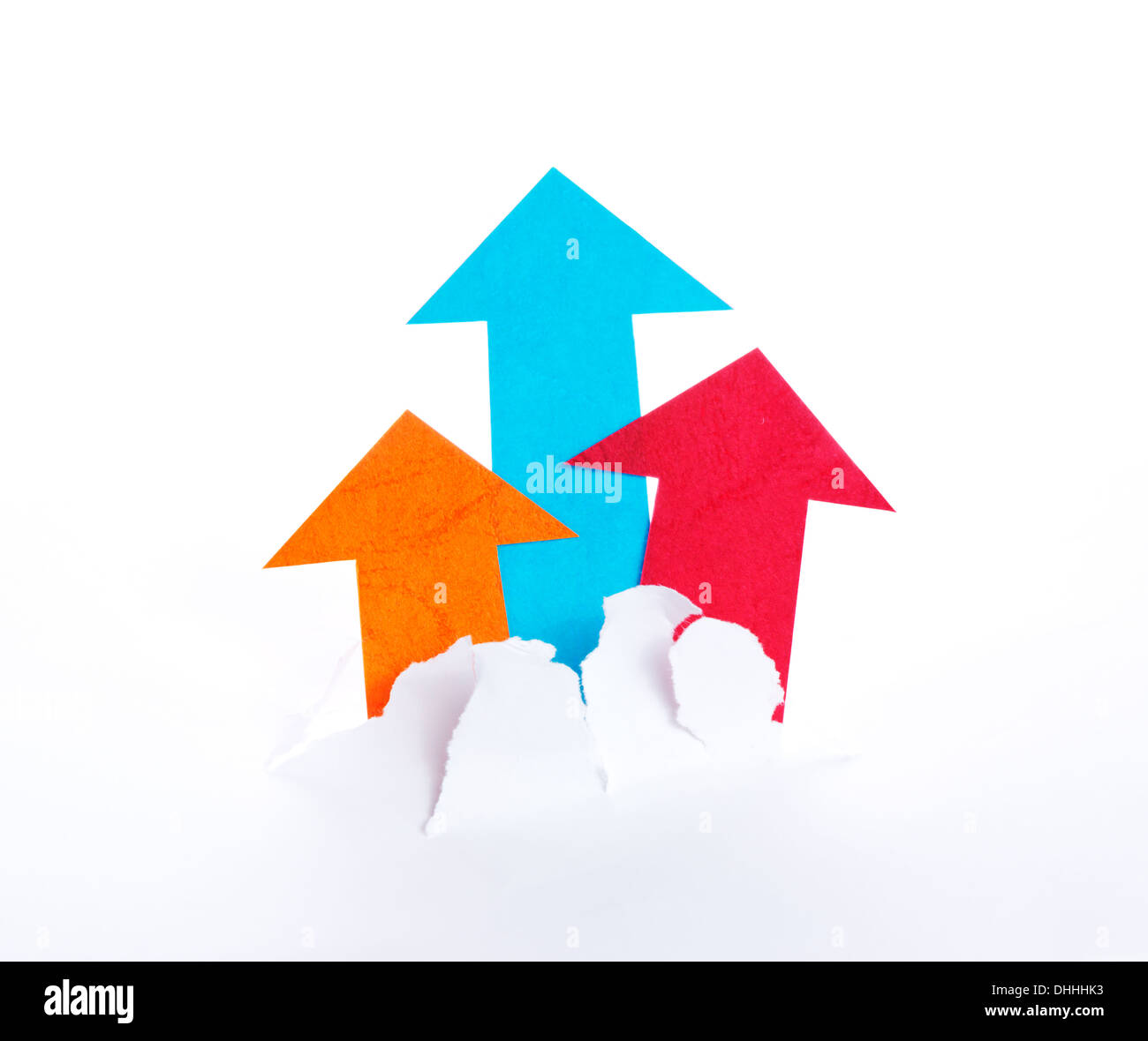 Arrowheads move upward and break paper Stock Photo - Alamy