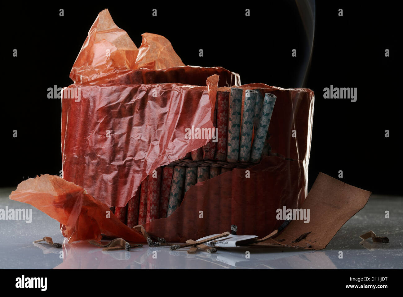 Still life with parcel of firecrackers and used matches Stock Photo - Alamy