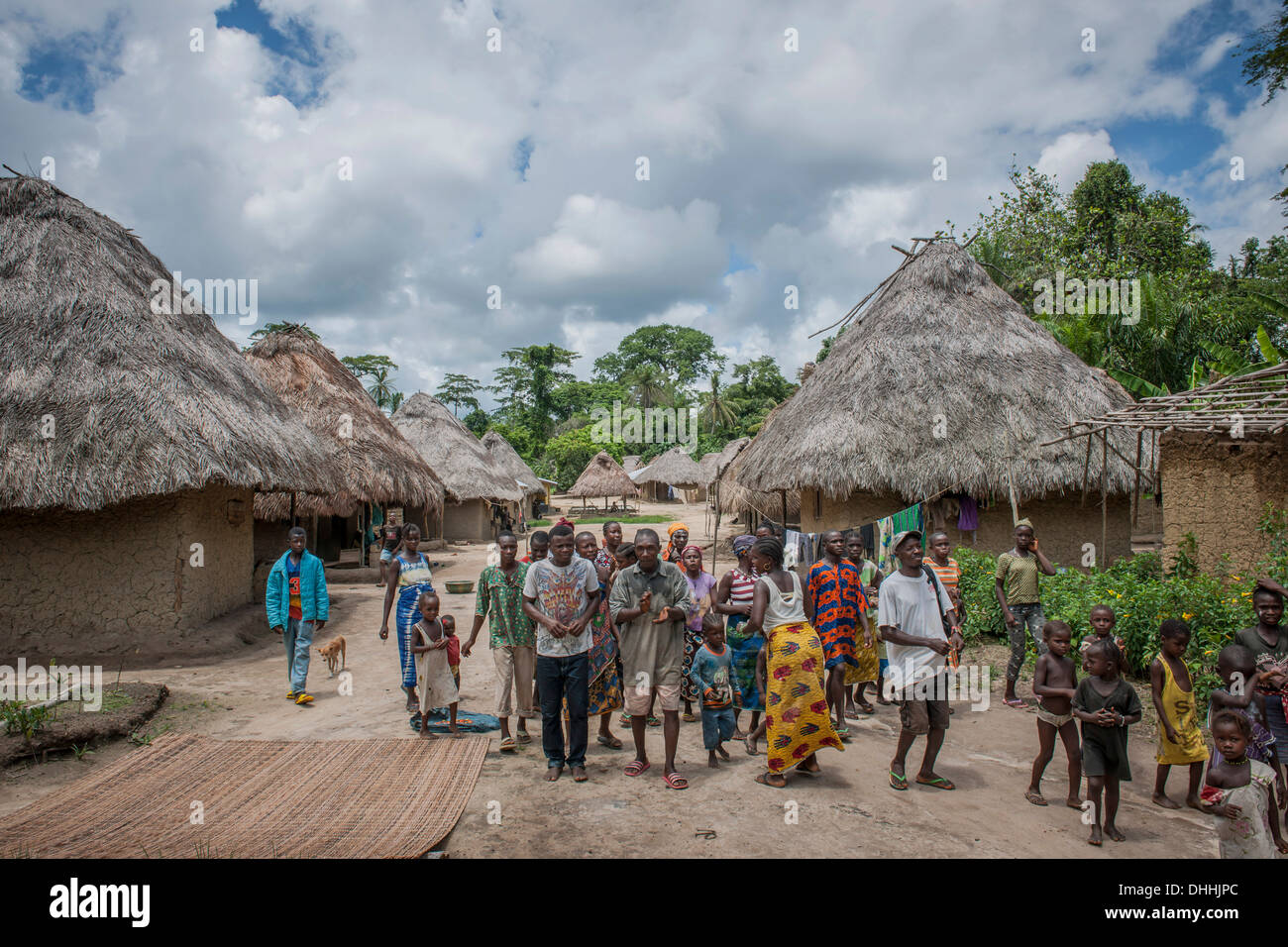 People celebrating in a village on the Moa River, Tiwai Island ...