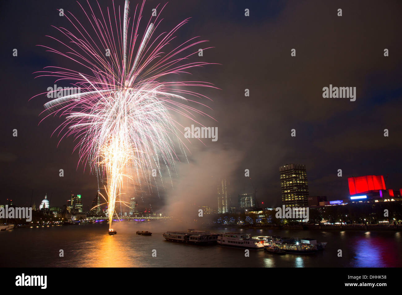 Skyline view of the South Bank of the River Thames and fireworks ...