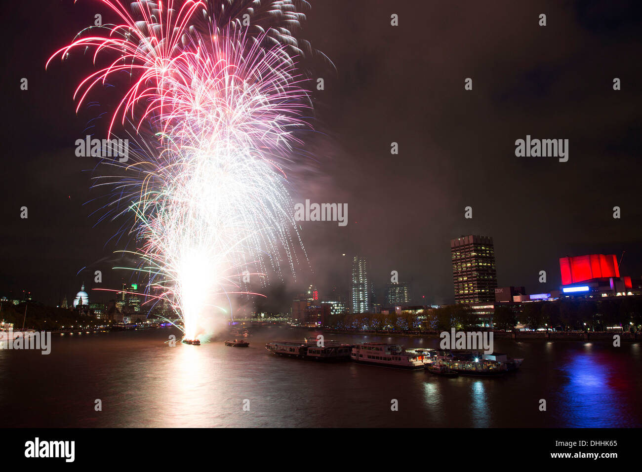 Skyline view of the South Bank of the River Thames and fireworks ...