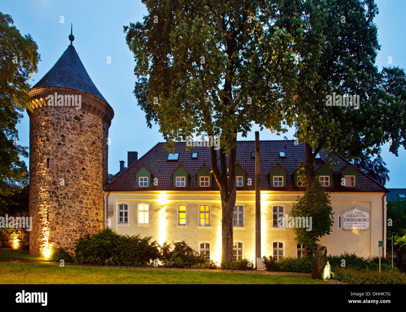 The illuminated Stephansturm, tower of St. Stephen, with the Engelsburg ...