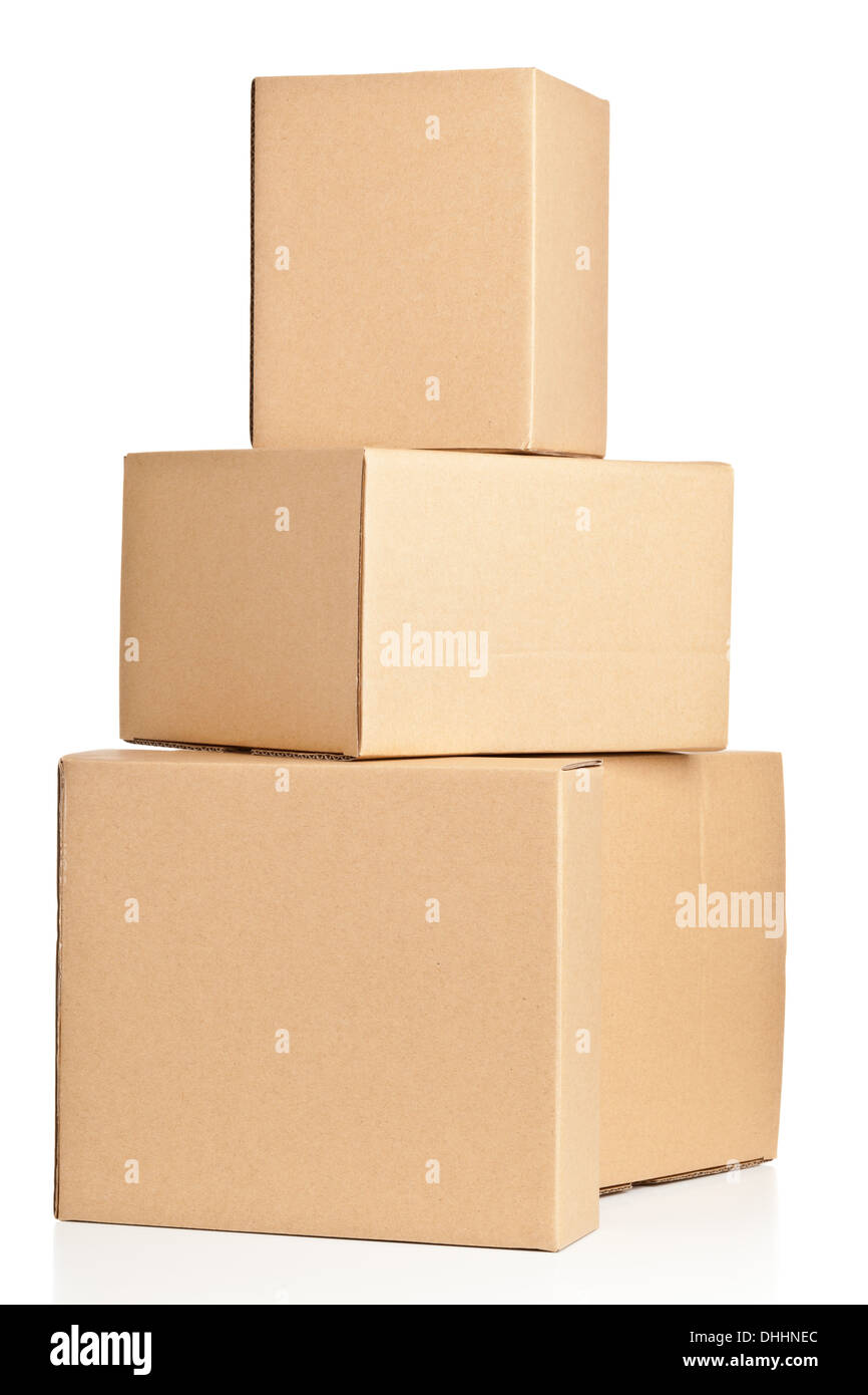 Stacked brown delivery carton boxes on white background Stock Photo - Alamy