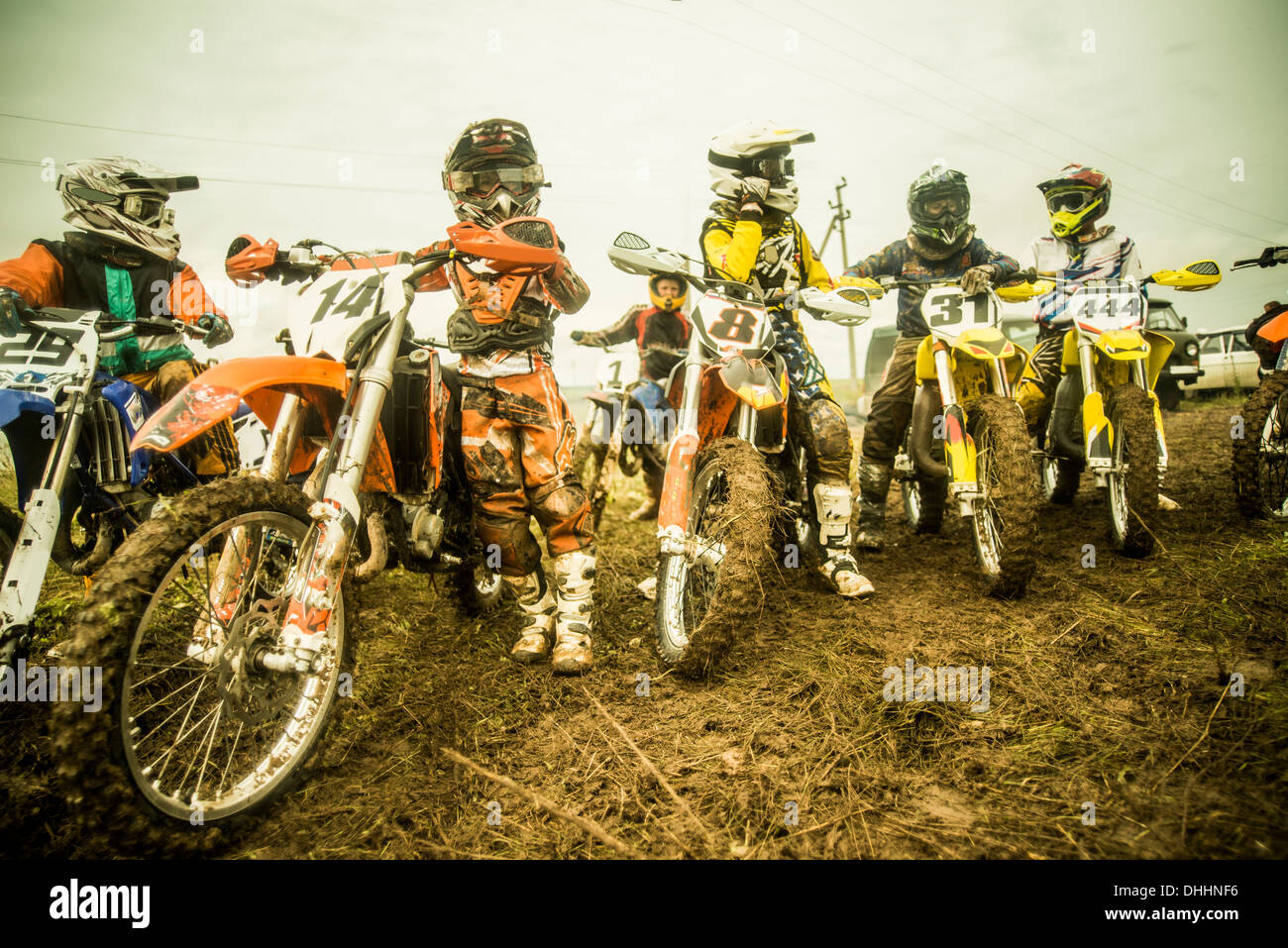 Group of boys on motorcycles at motocross Stock Photo - Alamy