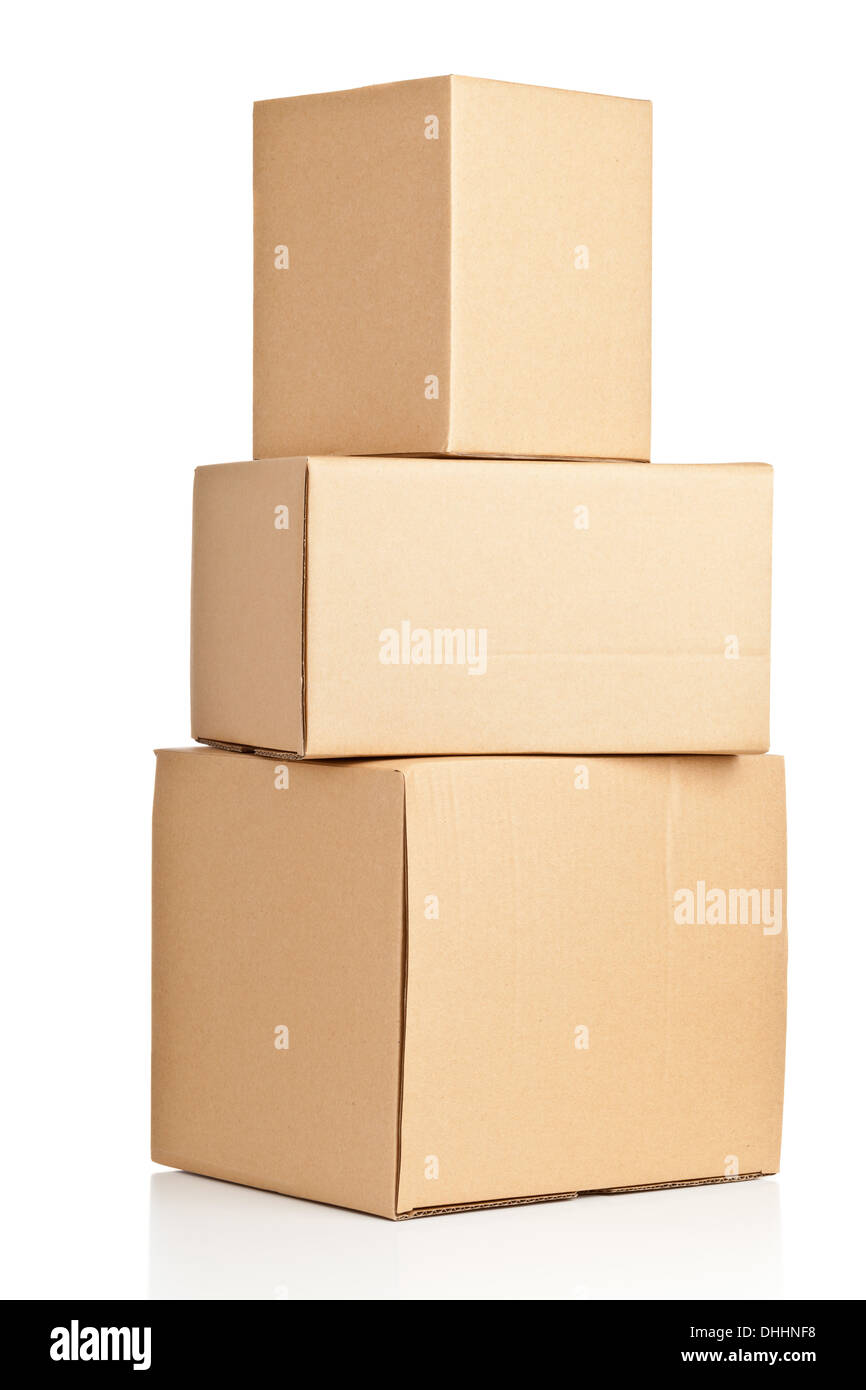 Stacked brown delivery carton boxes on white background Stock Photo - Alamy