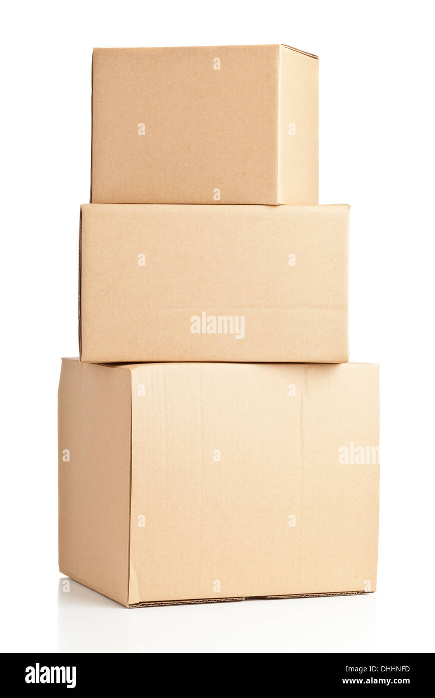 Stacked brown delivery carton boxes on white background Stock Photo - Alamy