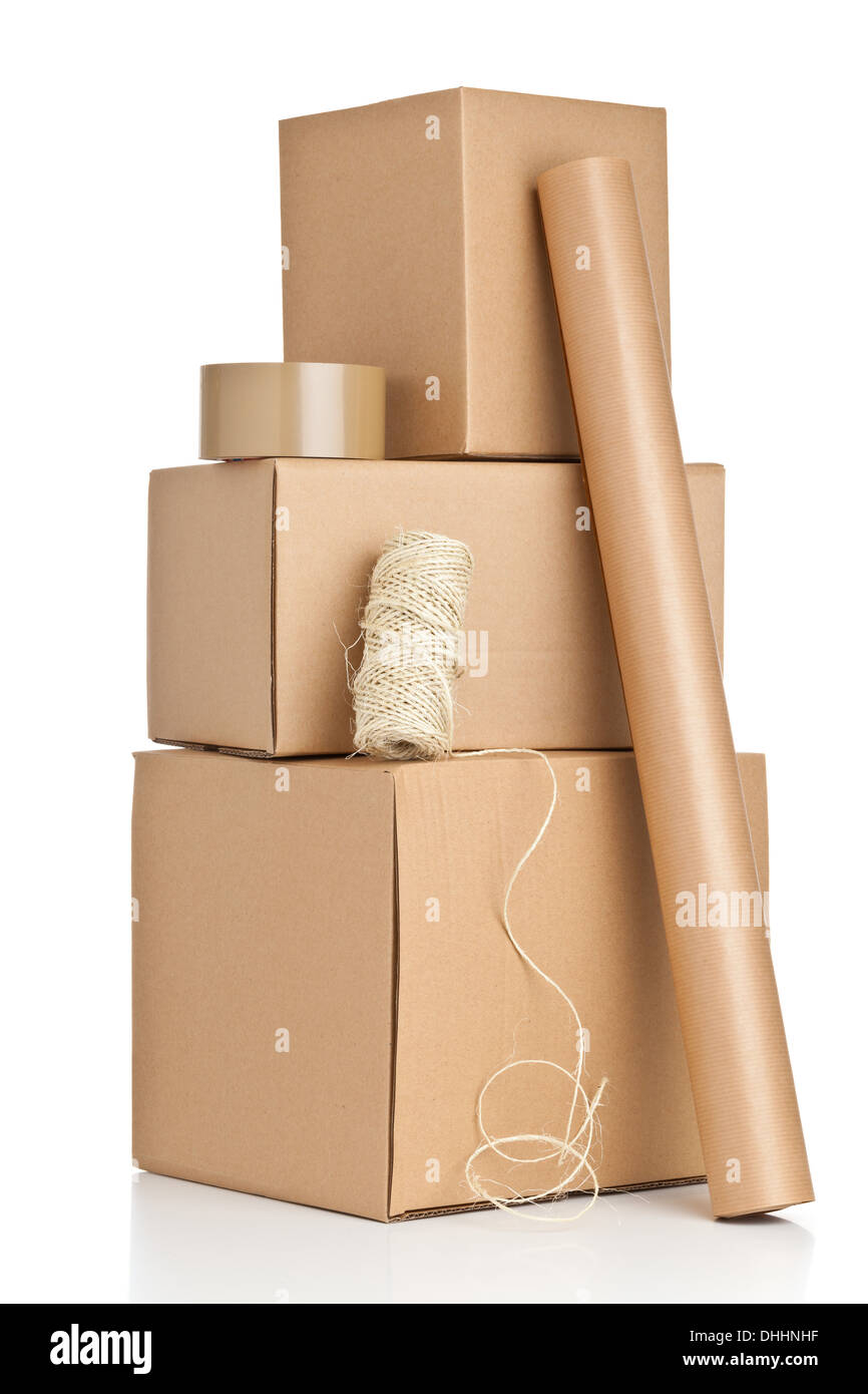 Brown carton boxes with packaging materials on white background Stock ...
