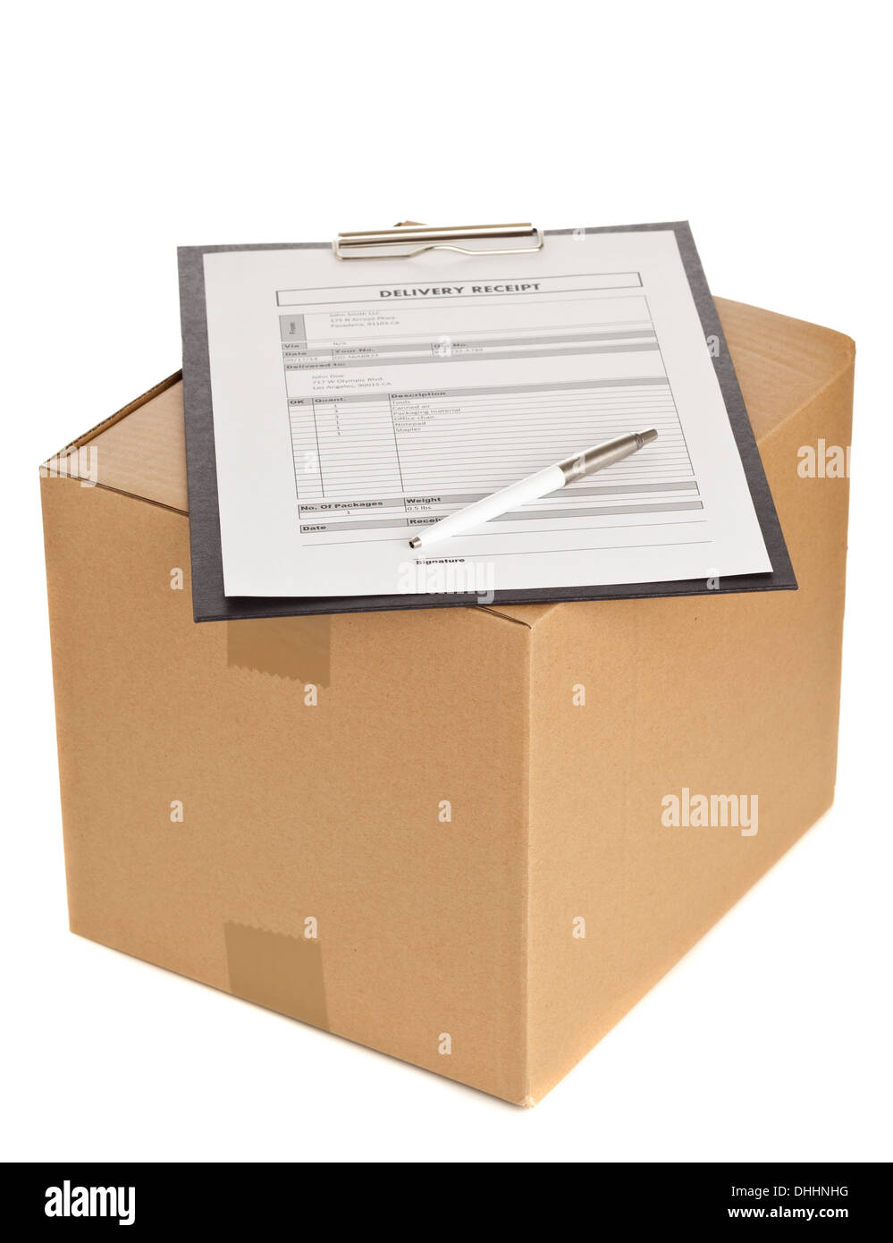 Brown carton box with clipboard and package delivery form on white ...