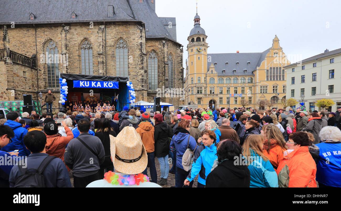 Koethen, Germany. 11th Nov, 2013. Visitors stand in front of a stage of ...