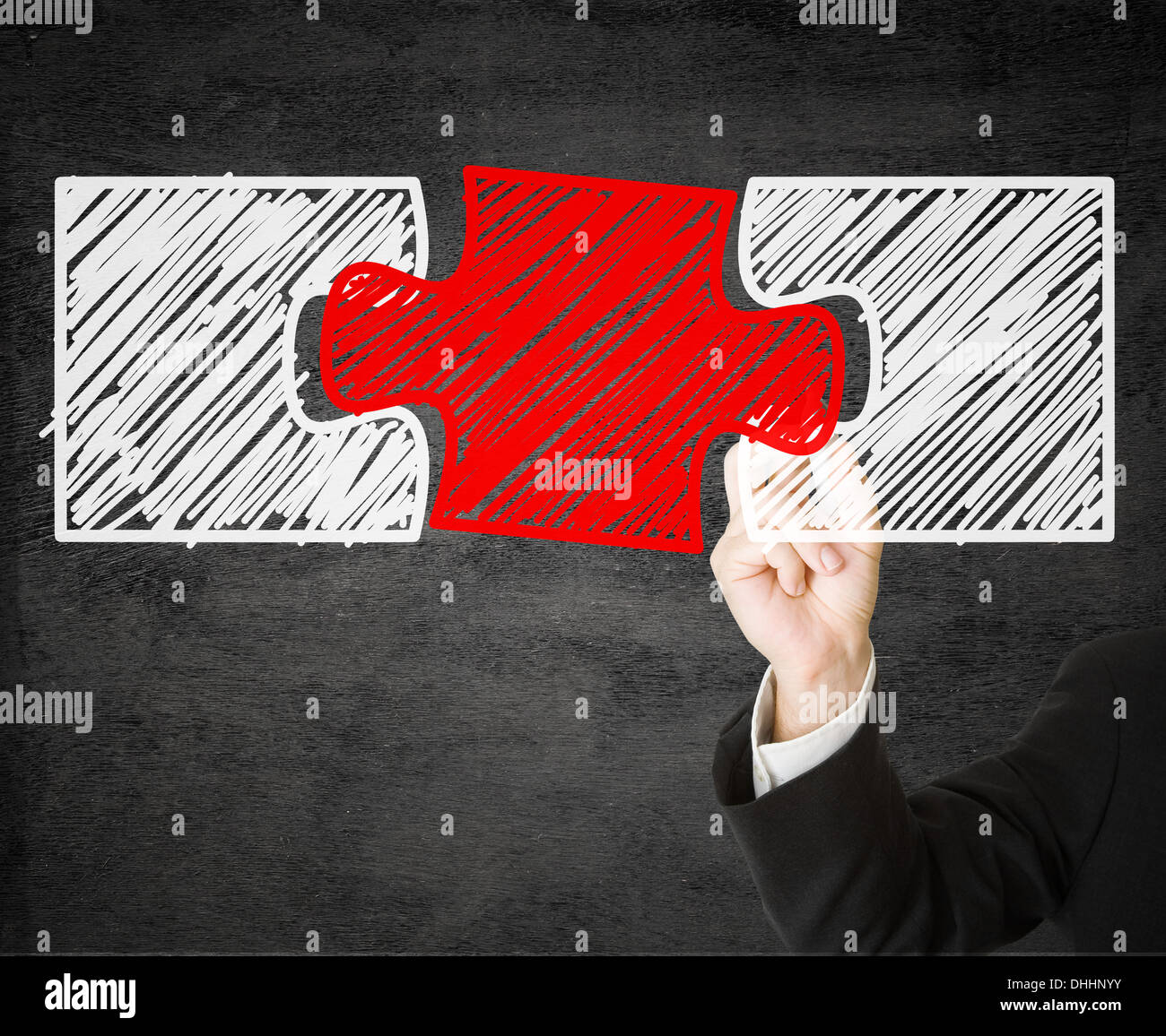 Business man drawing missing jigsaw puzzle piece on transparent drawing ...