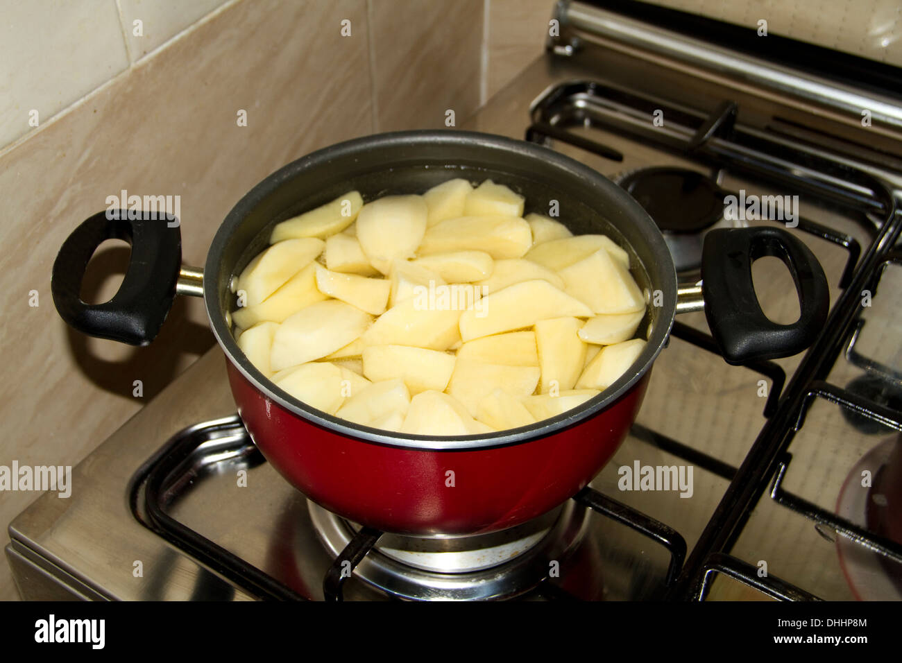 Cooking Potatoes in Cooking Pot Stock Photo - Alamy