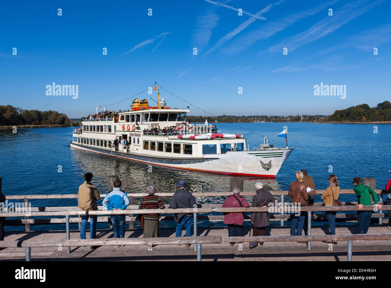 An excursion boat docking, Island Herrenchiemsee or Herreninsel ...