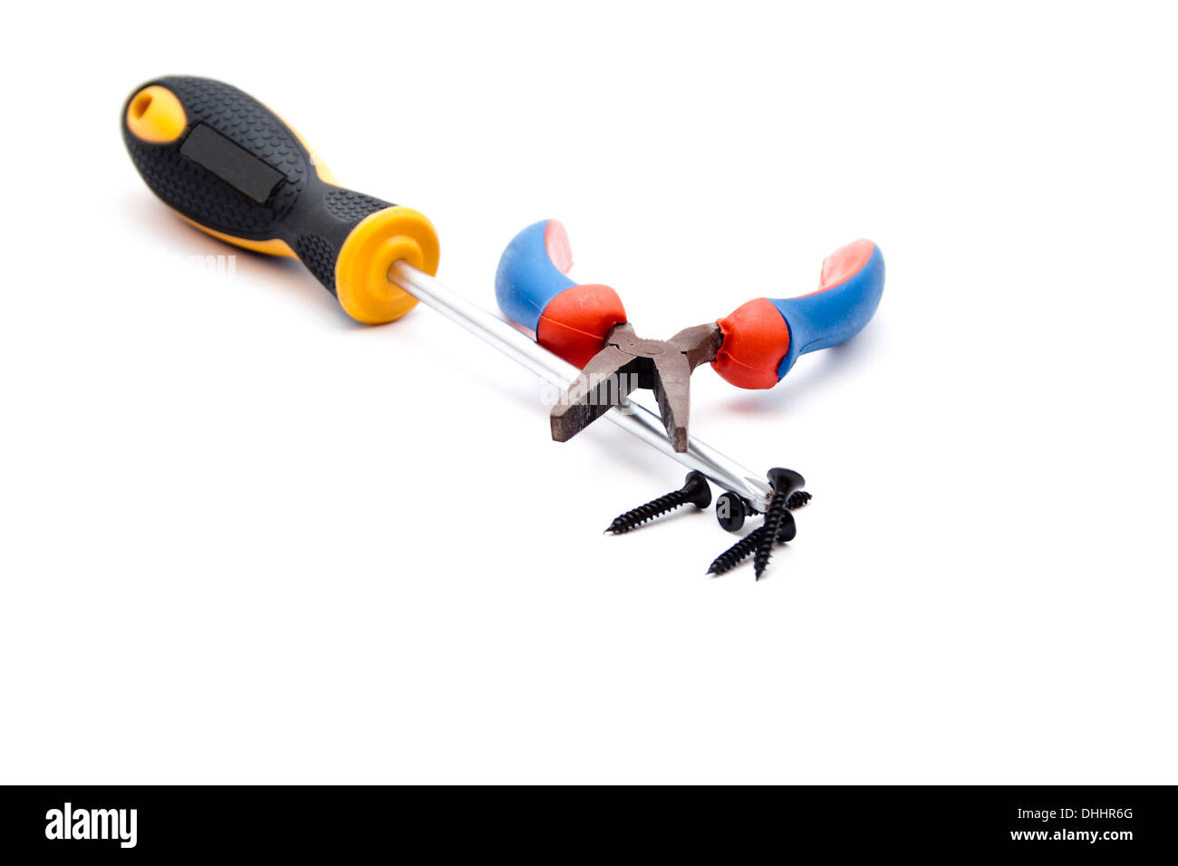 Screws with Screwdriver and Tong Stock Photo - Alamy