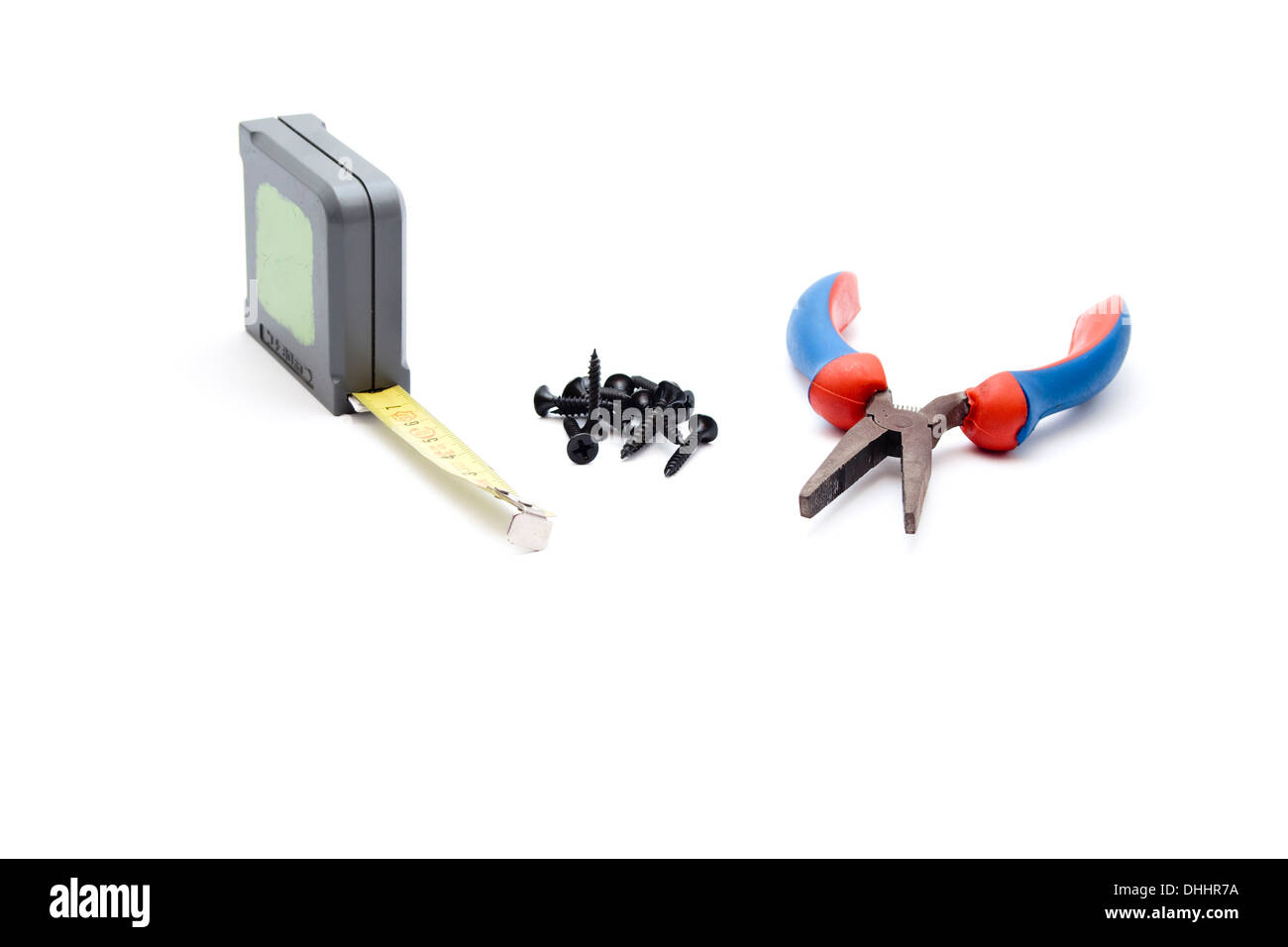 Measuring Tape with Screws and Tong Stock Photo - Alamy