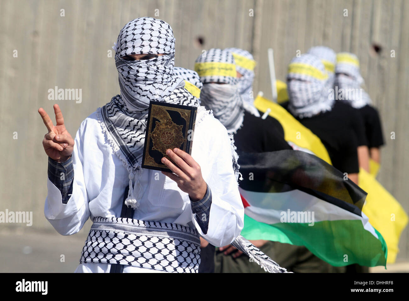 Ramallah, West Bank, Palestinian Territory. 11th Nov, 2013. Masked ...