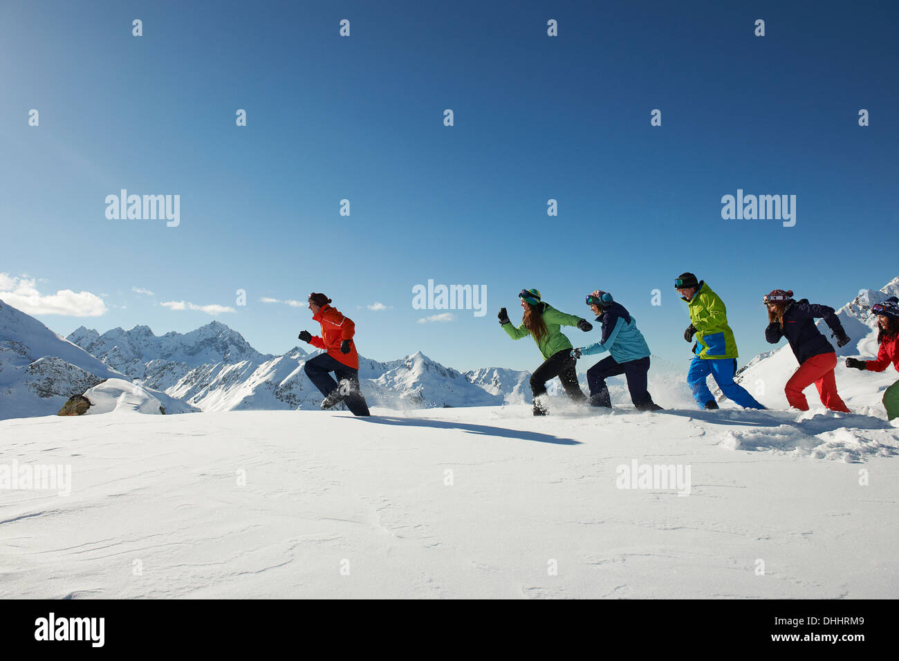 Man running in snow hi-res stock photography and images - Alamy