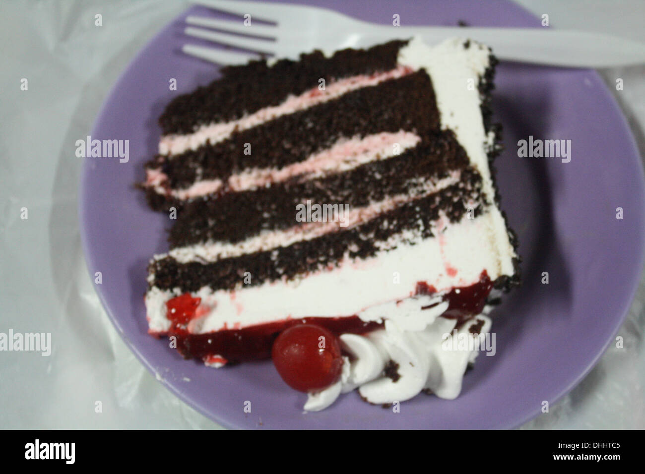 Slice of birthday cake Stock Photo - Alamy