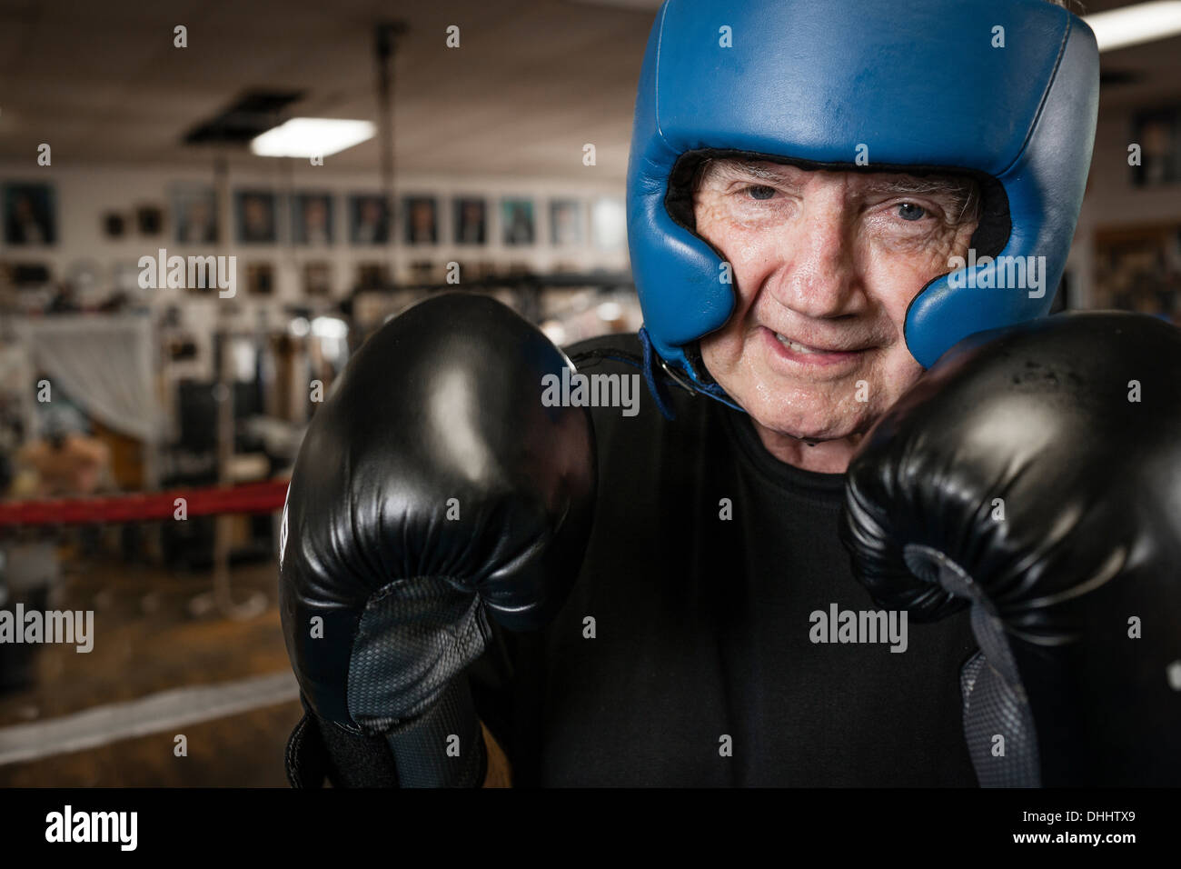 Man wearing boxing gloves hi-res stock photography and images - Alamy