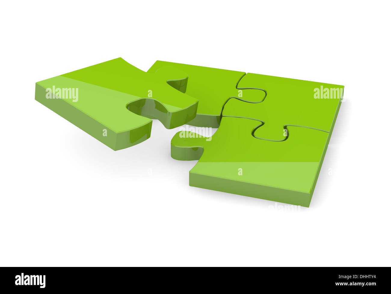 Four green pieces of puzzle Stock Photo - Alamy