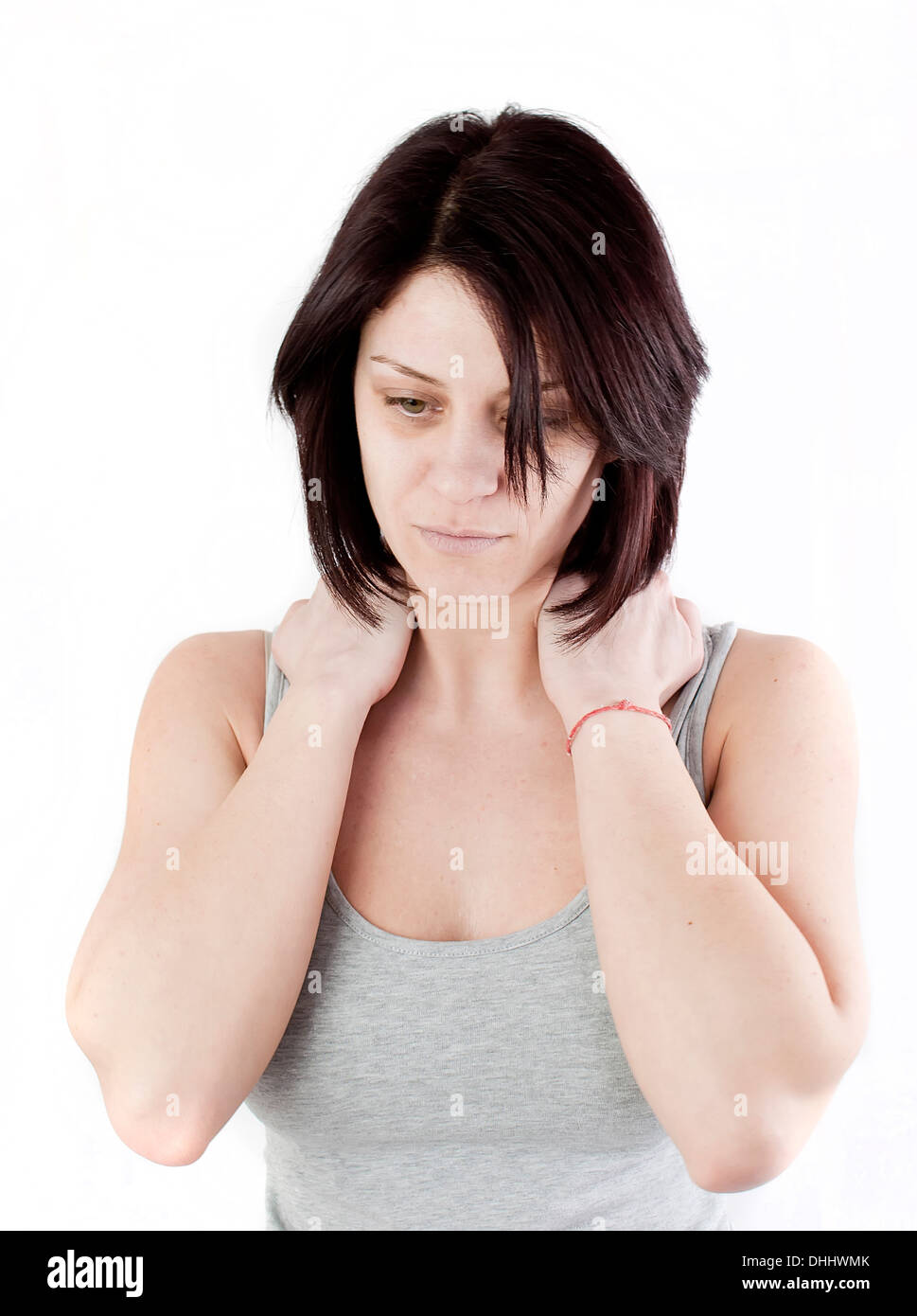Woman looking down holding neck hi-res stock photography and images - Alamy