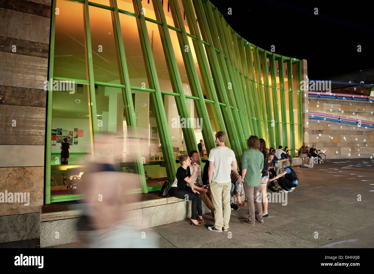 Young people in front of national gallery Stuttgart at night, Baden ...