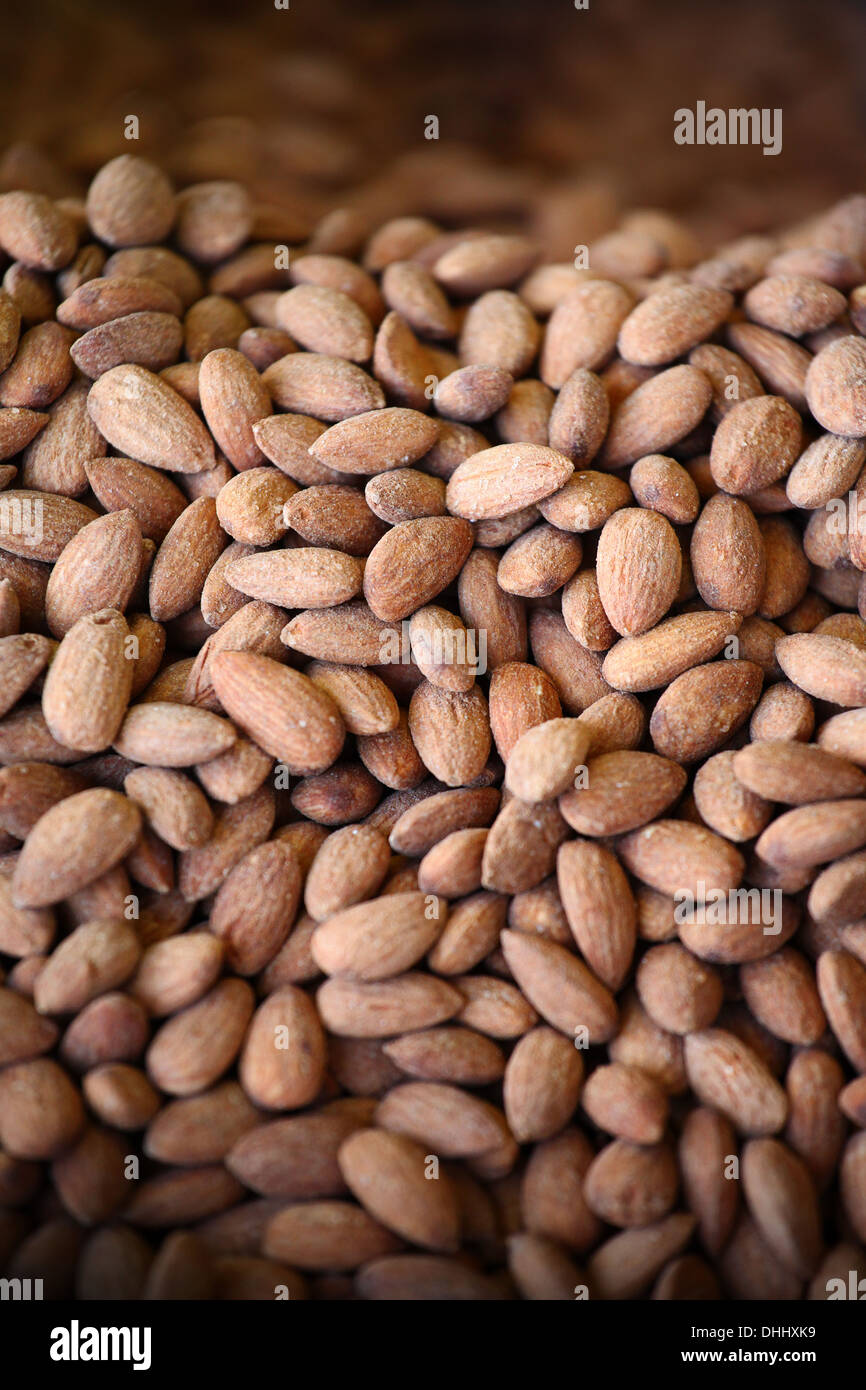 Nuts texture background Stock Photo - Alamy