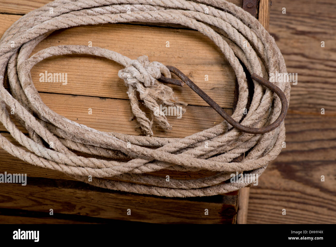 a old used rope in the workroom Stock Photo - Alamy