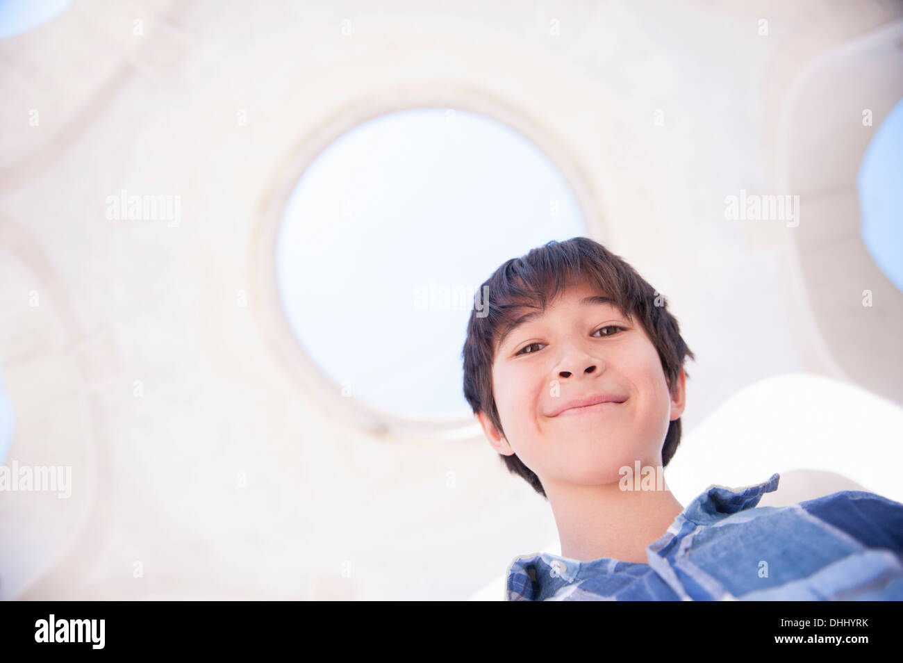 Portrait of boy smiling, low angle Stock Photo - Alamy