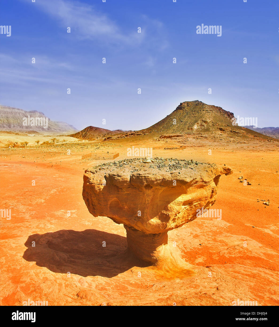 Huge rock in the heated desert Stock Photo - Alamy