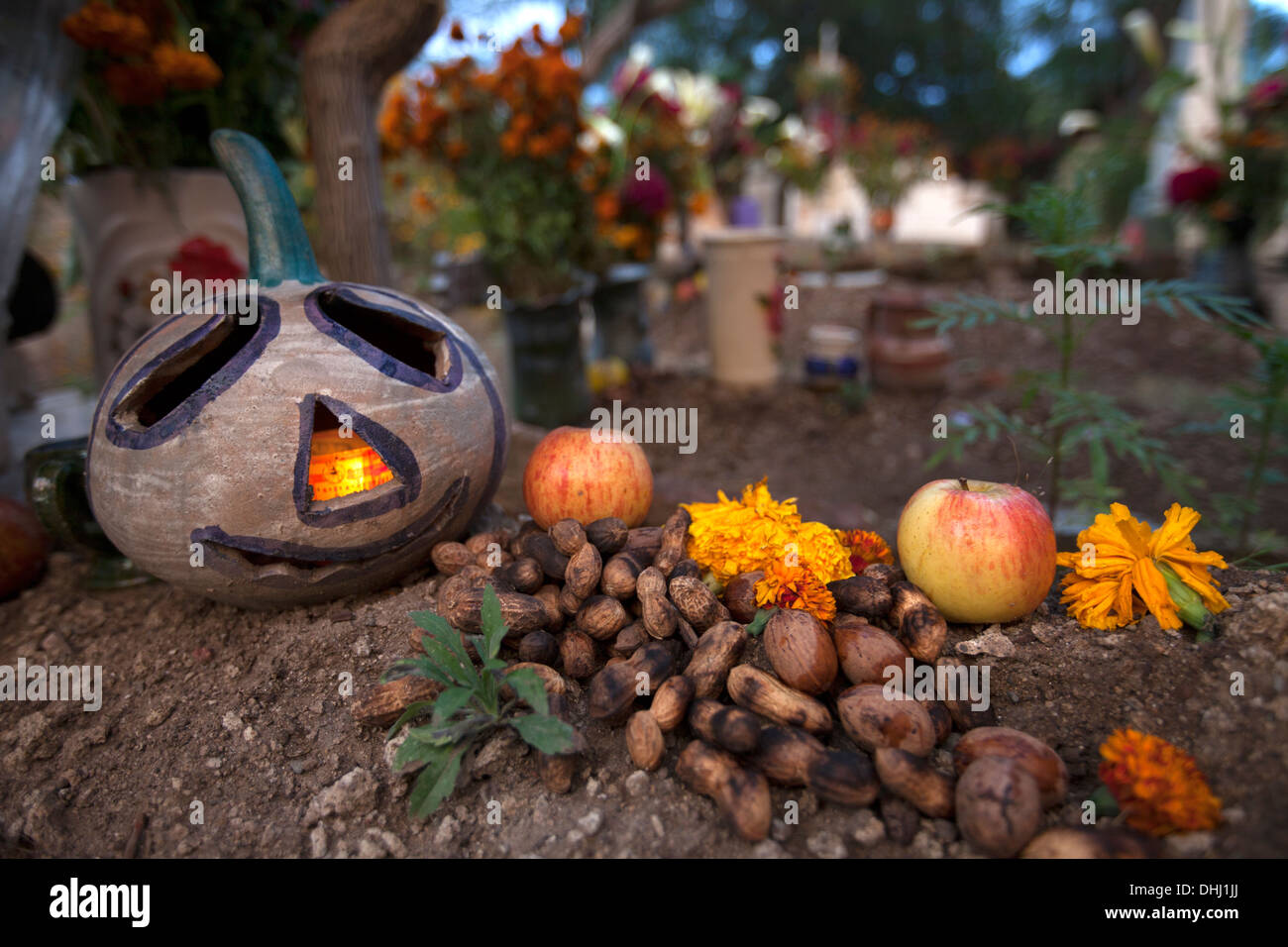 Grave offering hi-res stock photography and images - Alamy