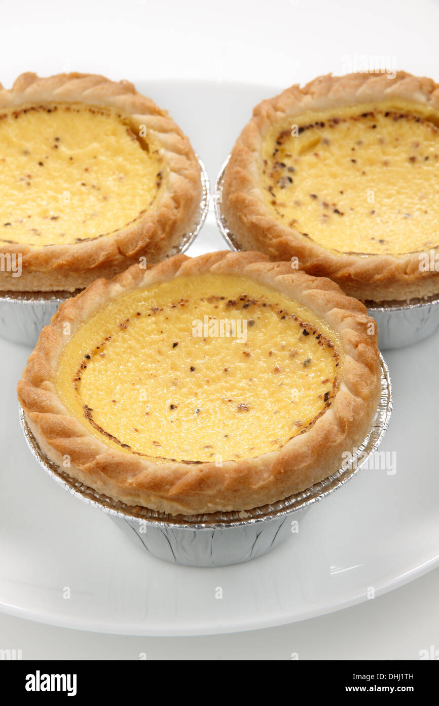 British style egg custard tarts sprinkled with nutmeg Stock Photo - Alamy