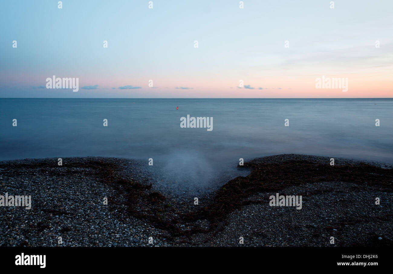 Slow shutter speed images at sunset of Freshwater Bay on the Isle of ...