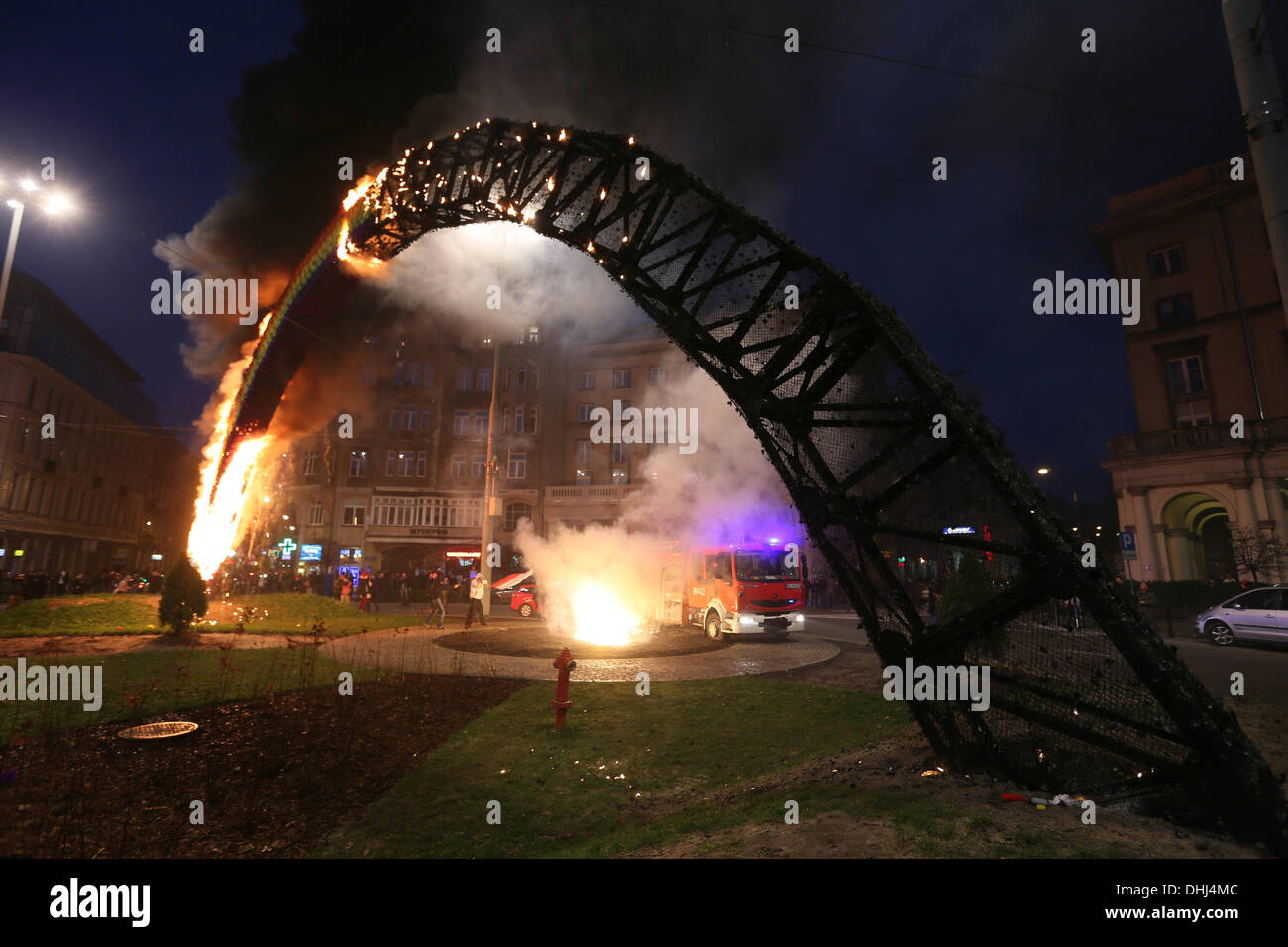 Warsaw, Poland. 11th Nov, 2013. A 'Rainbow' installation is set on fire ...