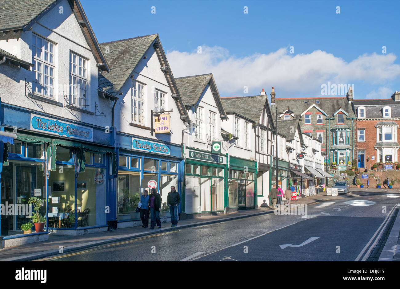 People walking along Bank Street, Keswick town centre, Cumbria, England ...