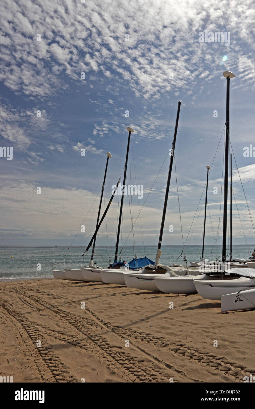 Sailing boats on beach Stock Photo - Alamy