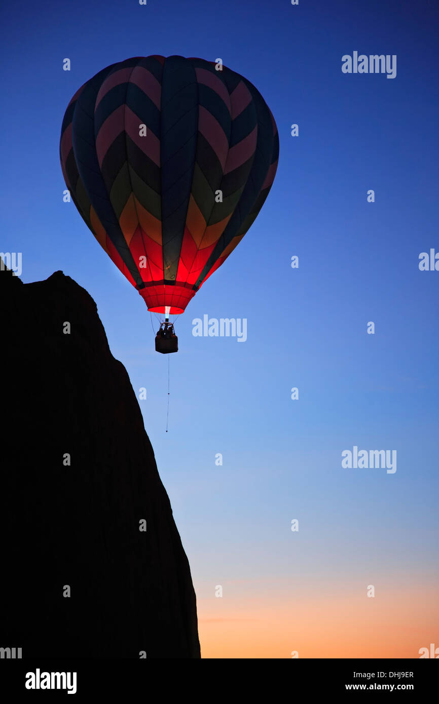 Hot air balloon near bluff, "Dawn Patrol" event, Red Rock Balloon Rally ...