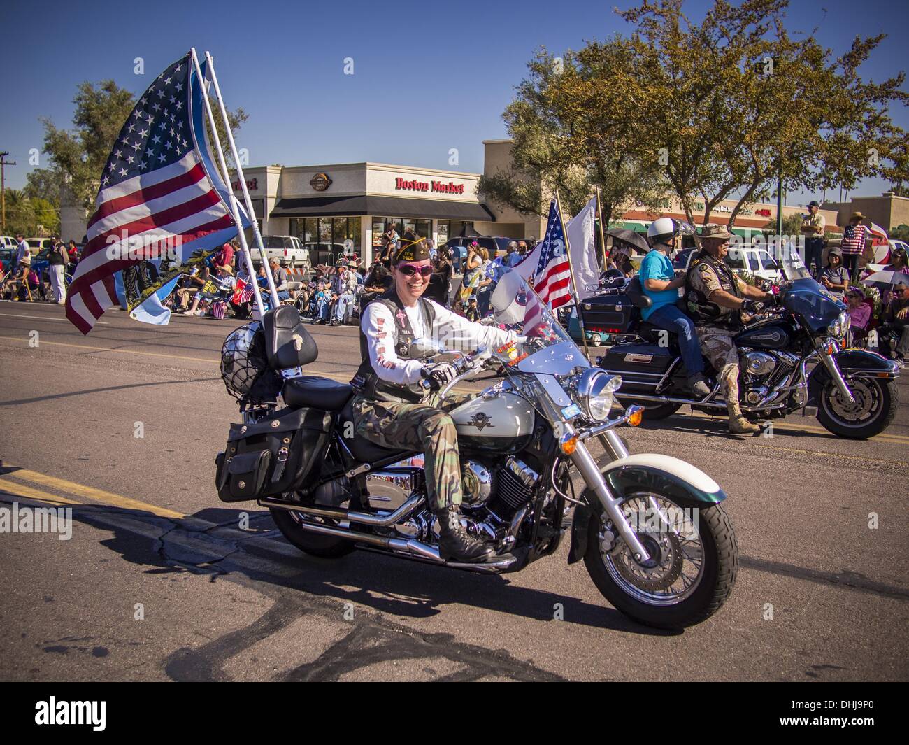 Phoenix, Arizona, USA. 11th Nov, 2013. A member of the VFW rides in the ...