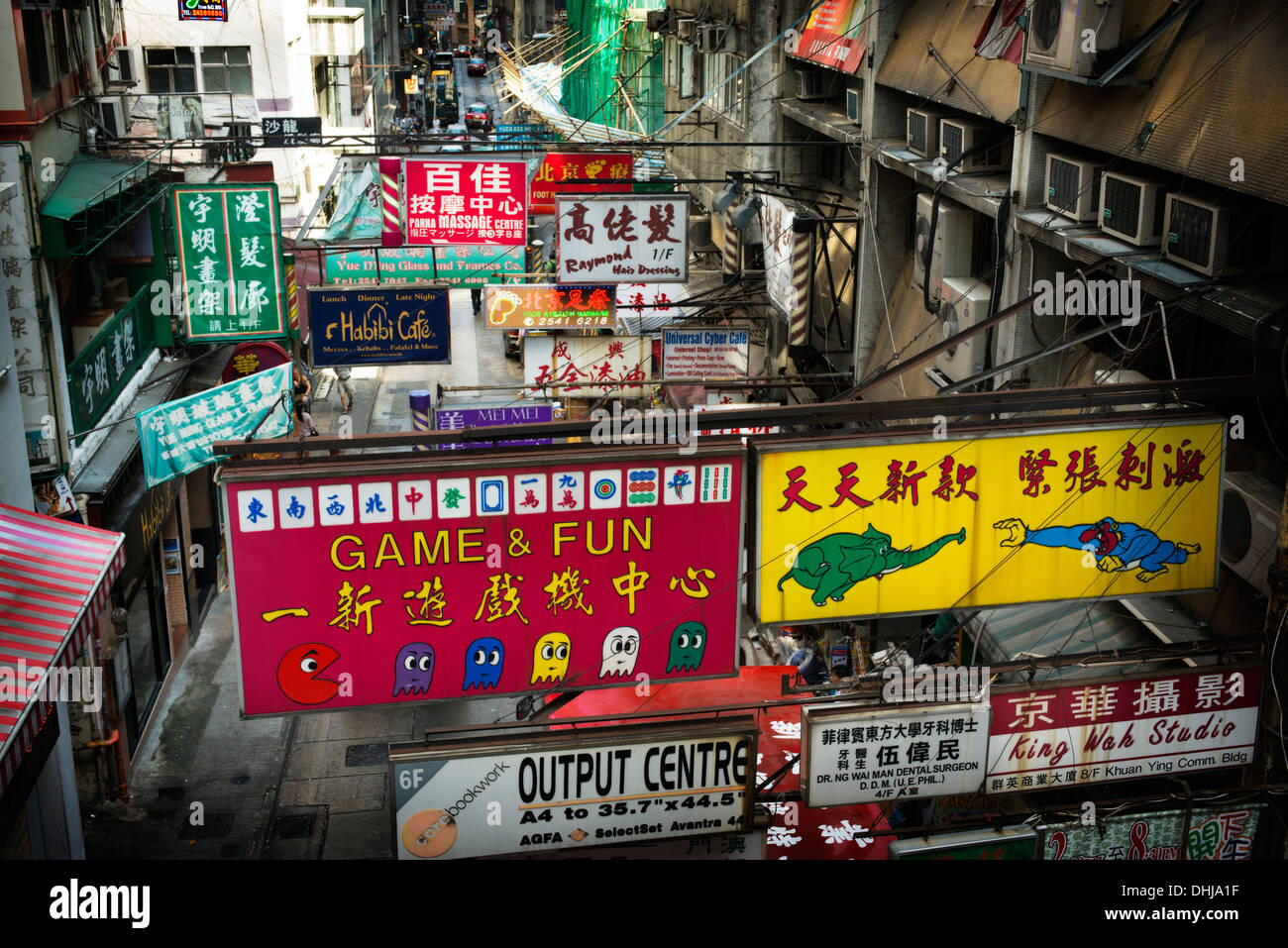 Street signs hanging from buildings Stock Photo - Alamy