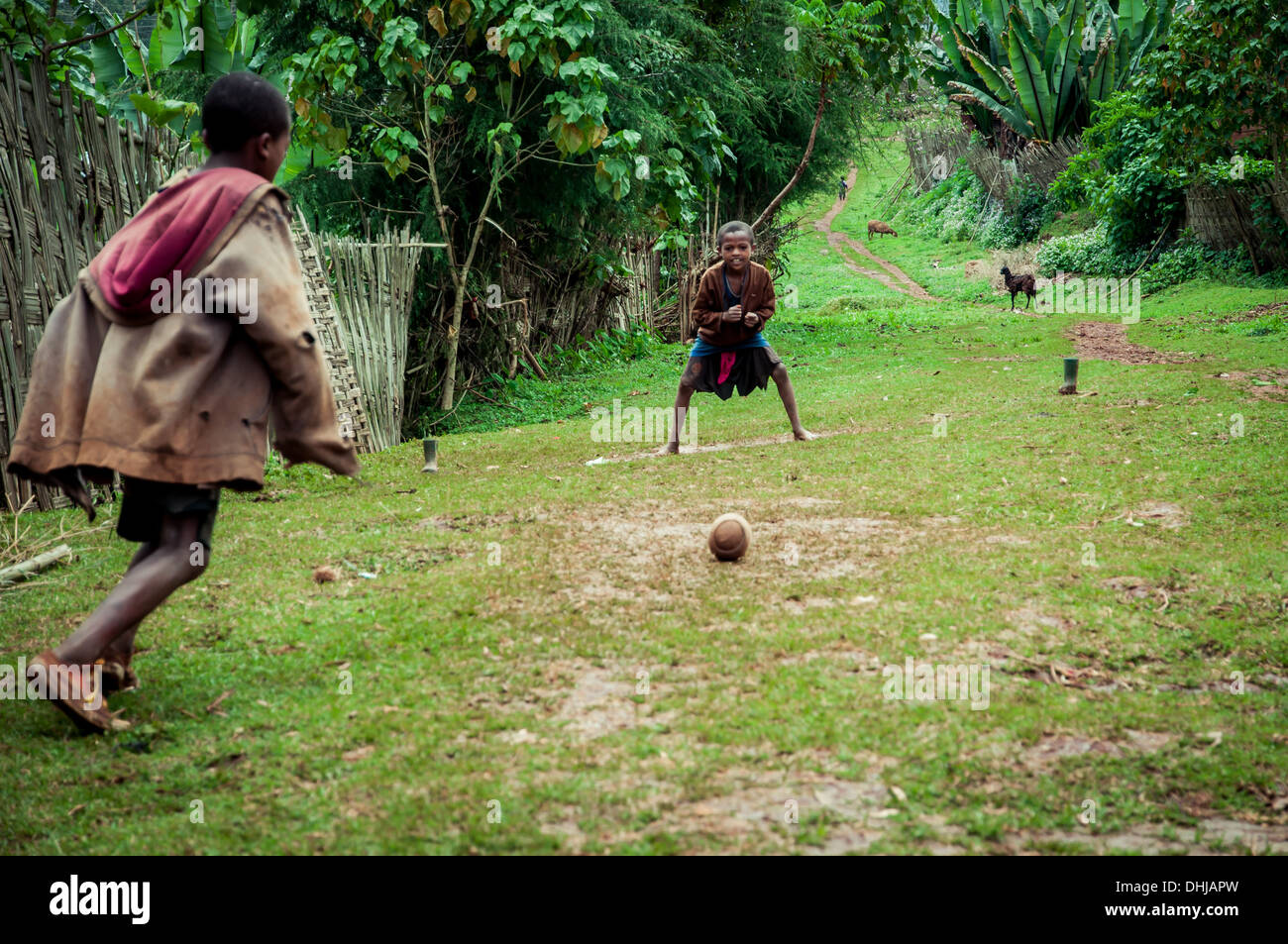 A member of the tribe poses to be taken a picture in Omo Valley ...