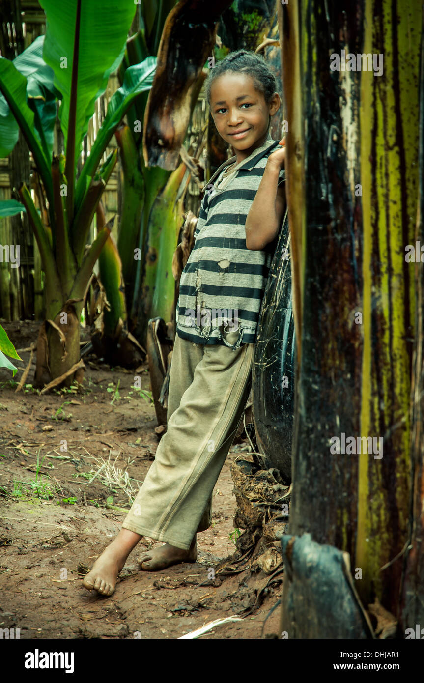 A member of the tribe poses to be taken a picture in Omo Valley ...